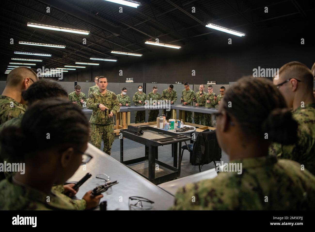 Recruits recieve weapons familiarization training at the Small Arms ...