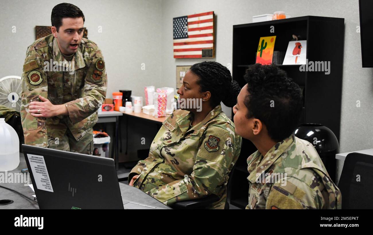 Maj. Matthew MacDonald, left, chief of training for the 363rd Training ...