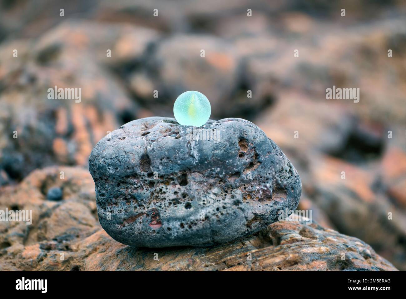 A beautiful sea marble etched and frosted from tumbling in the Atlantic ...