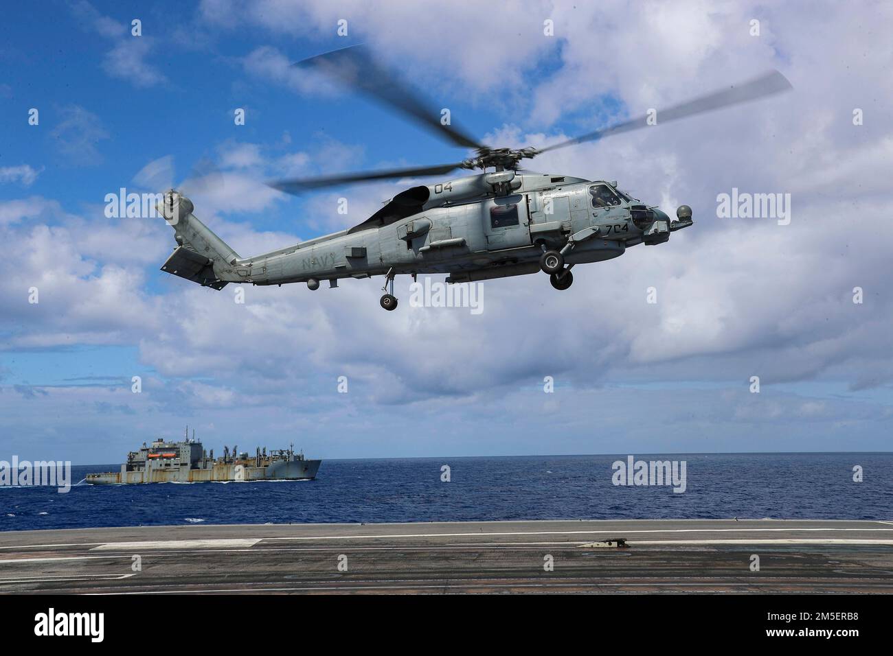PHILIPPINE SEA (March 9, 2022) An MH-60R Sea Hawk helicopter, assigned ...