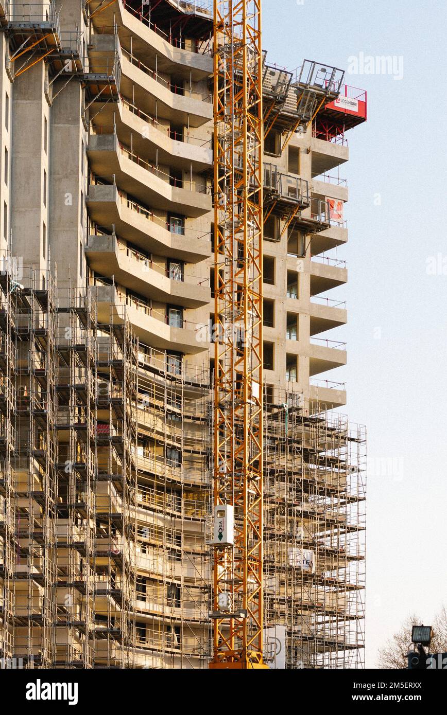 A vertical shot of the construction process of a big building in Paris ...