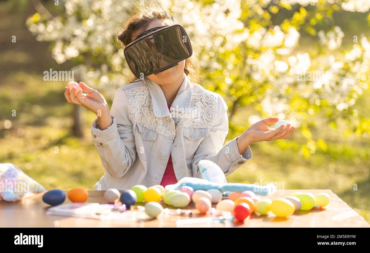 teenage girl with easter egg VR set on his head Stock Photo - Alamy