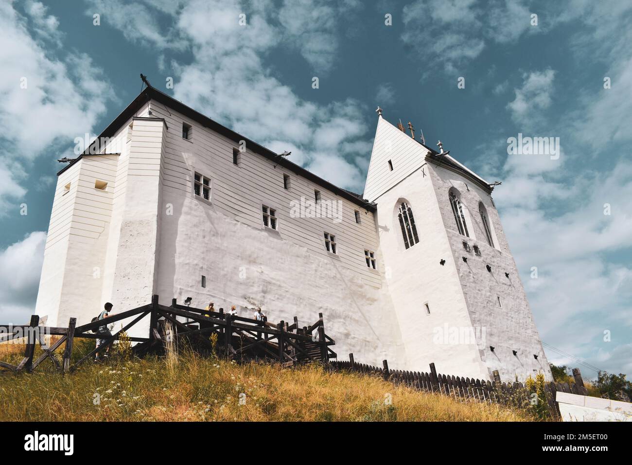 A low-angle shot of the medieval Fuzer castle in Hungary against the ...