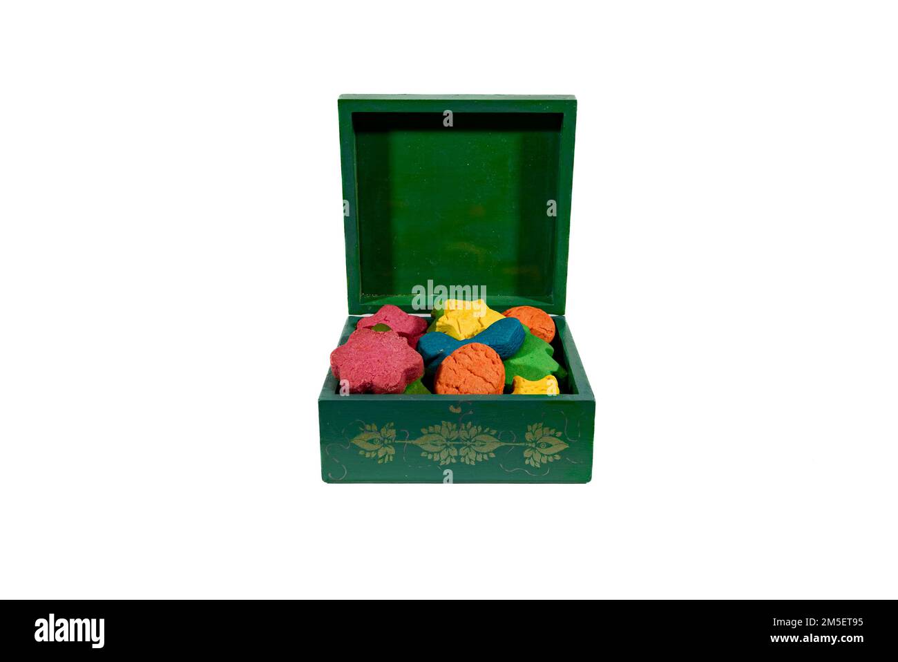 Christmas or new year cookies on green box at white background isolated ...