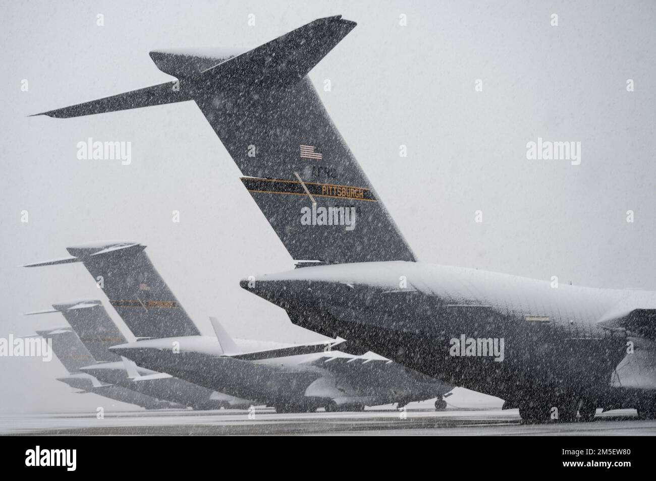 C-17 Globemaster III aircraft assigned to the 911th Airlift Wing sit on ...