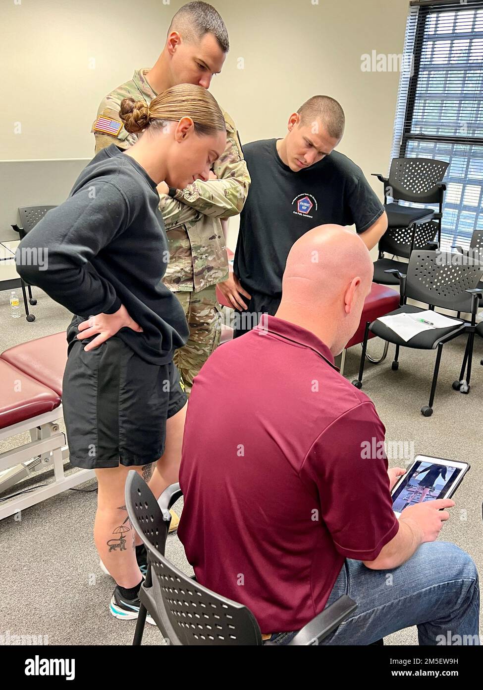 Pictured from left: Spc. Madeleine Bryan, 1st Lt. Steven Candeto and ...