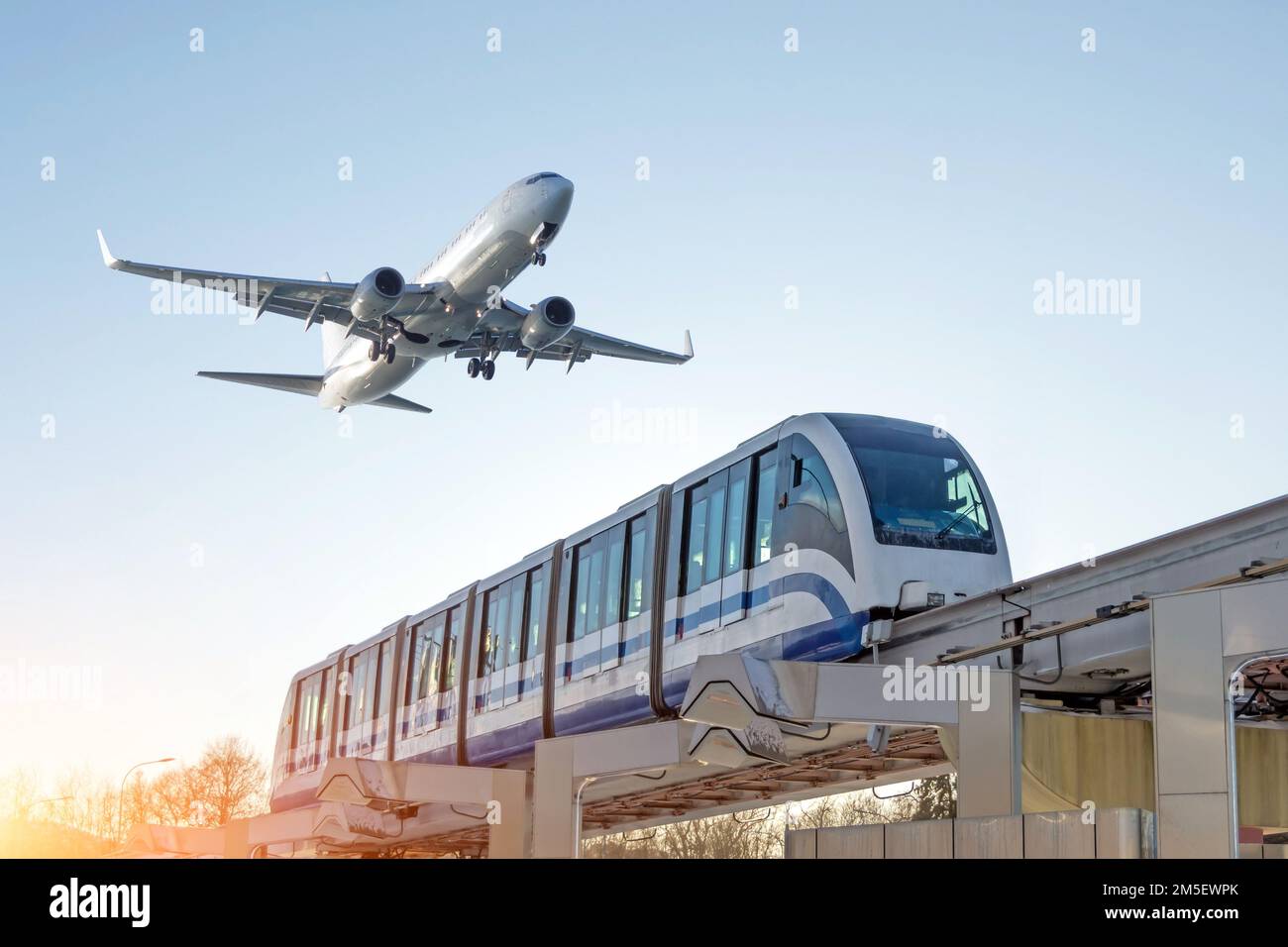 View railway track and suburban electric monorail train rushing to ...