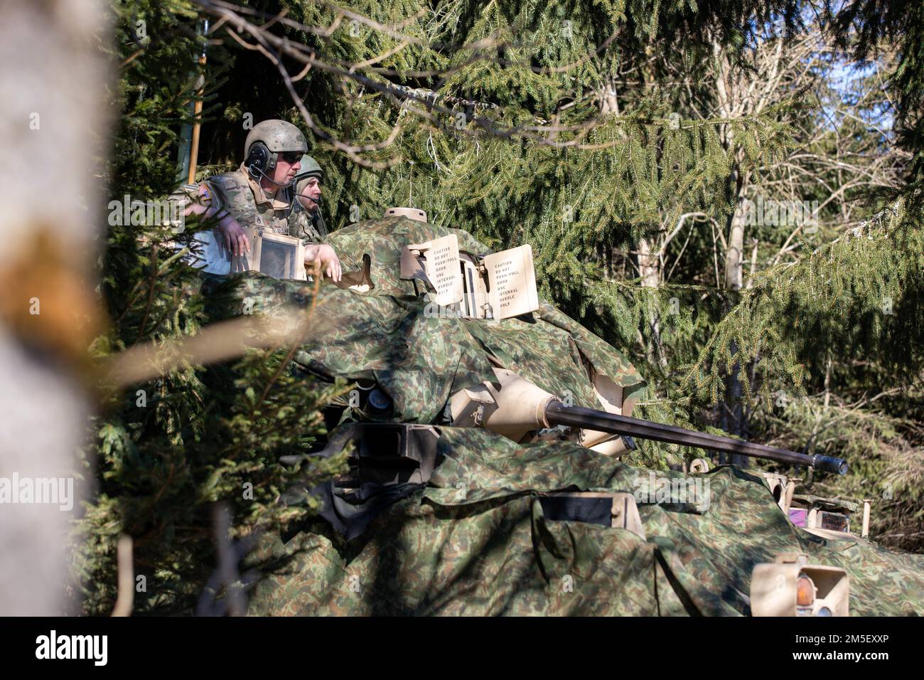 U.S. Army Staff Sgt. Dustin Herd and Sgt. Christopher Widner, assigned ...