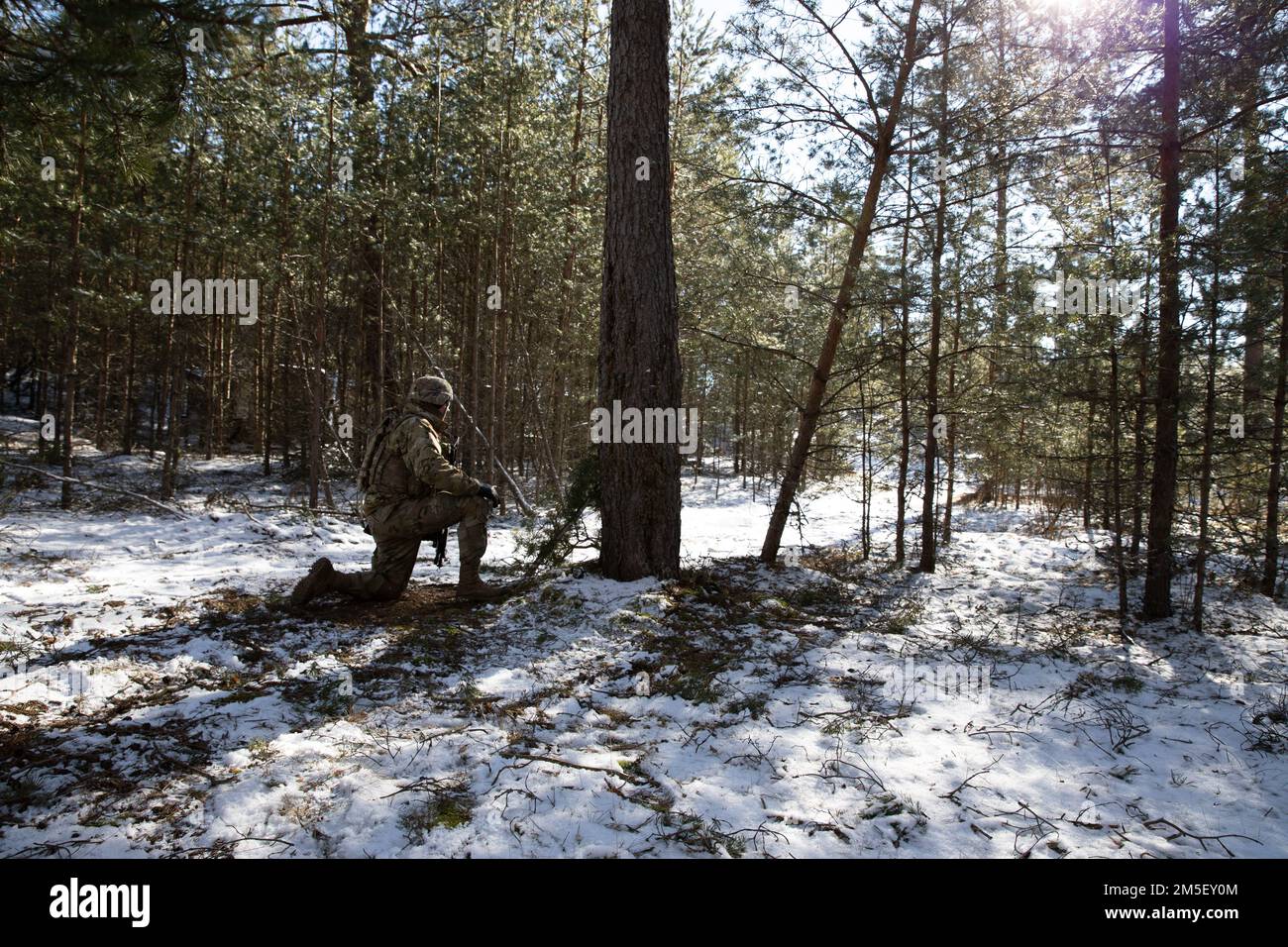 U.S. Army Pfc. Hunter Mikulich scans his surroundings during a training ...