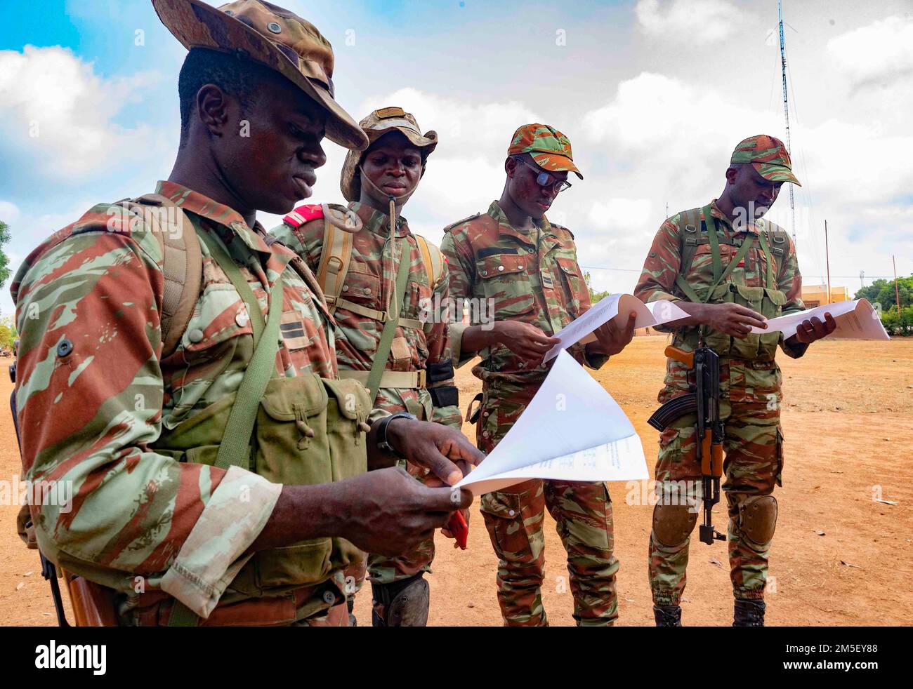 Officers from the Benin 1st Commando Parachute Battalion review their ...