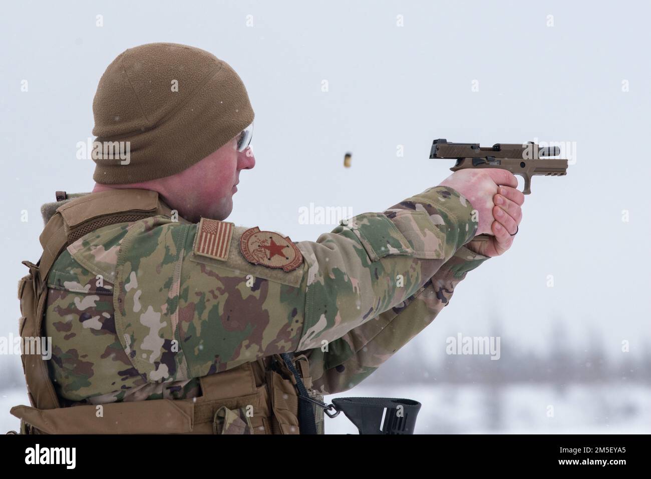 A U.S. Air Force Airman assigned to the 673d Security Forces Squadron ...