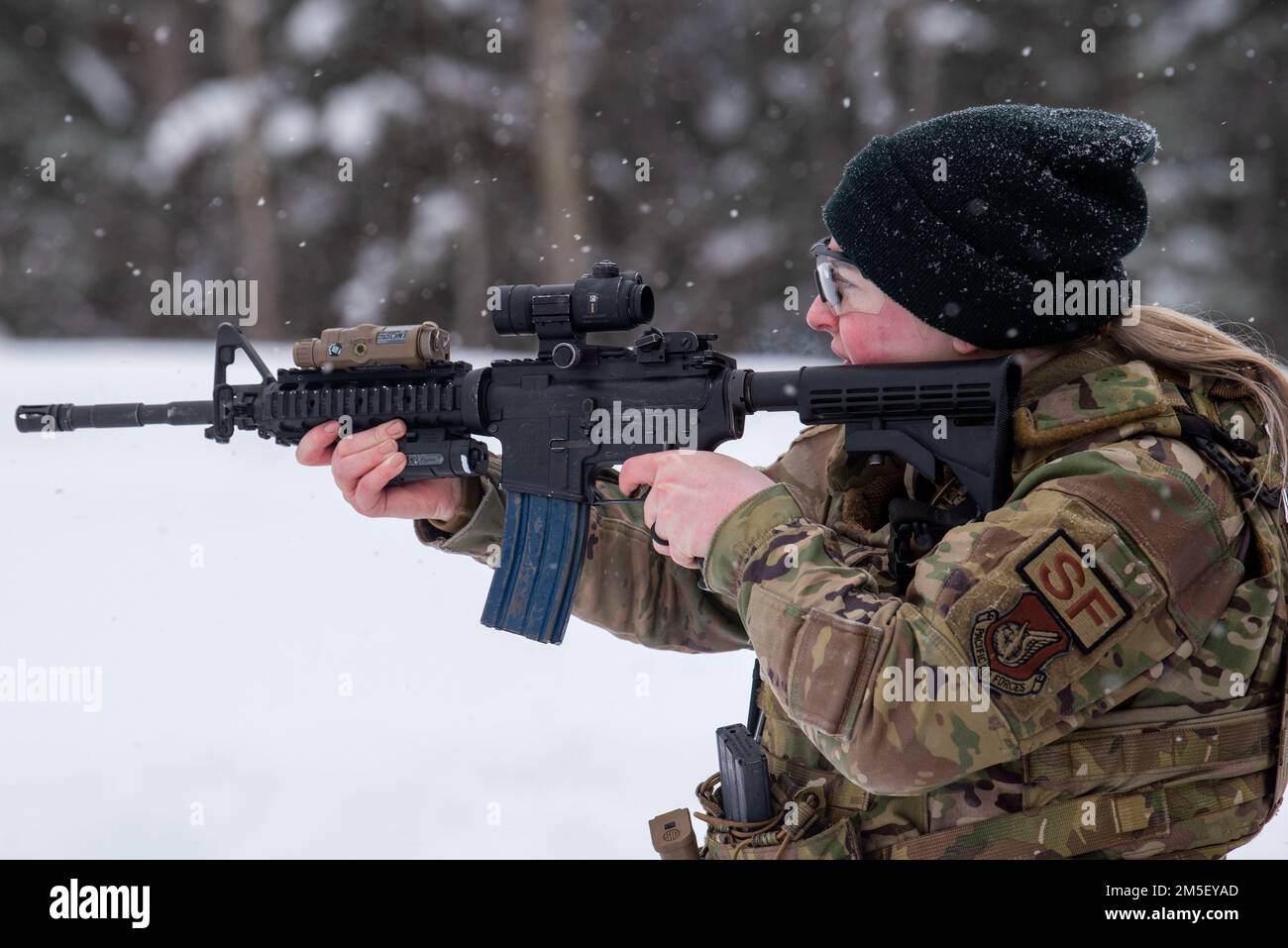 A U.S. Air Force Airman assigned to the 673d Security Forces Squadron ...