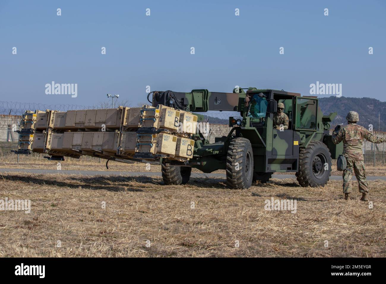 Soldiers assigned to the 35th Air Defense Artillery Brigade move ...