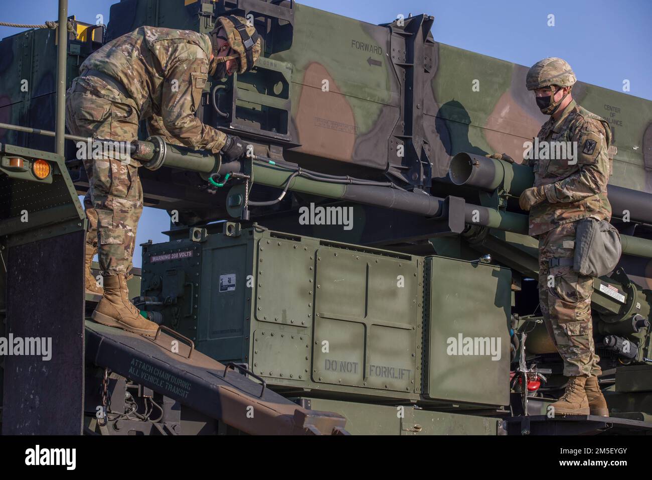 Soldiers assigned to the 35th Air Defense Artillery Brigade assemble an ...