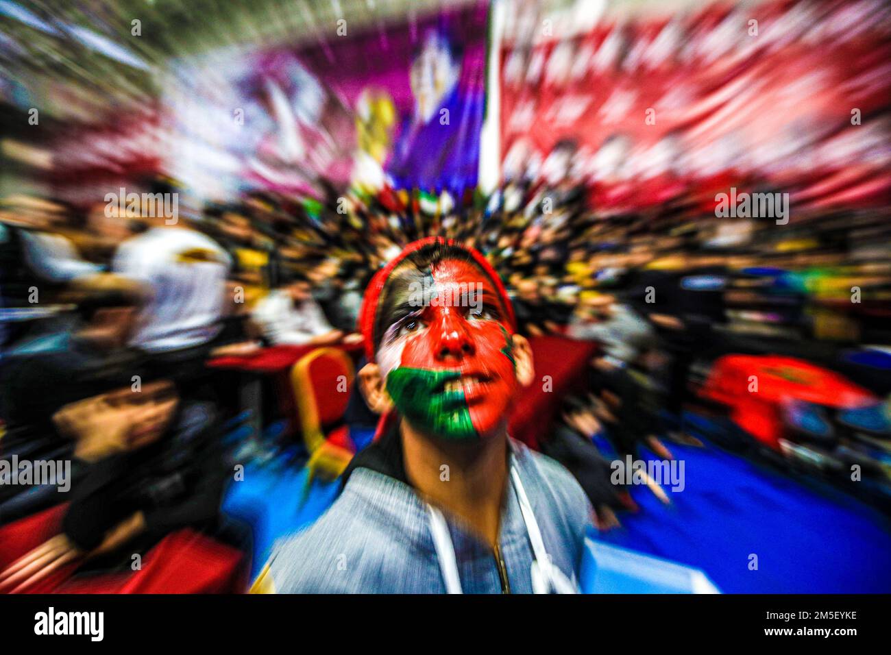 Palestinian football fans lift the national and Moroccan flags as they ...