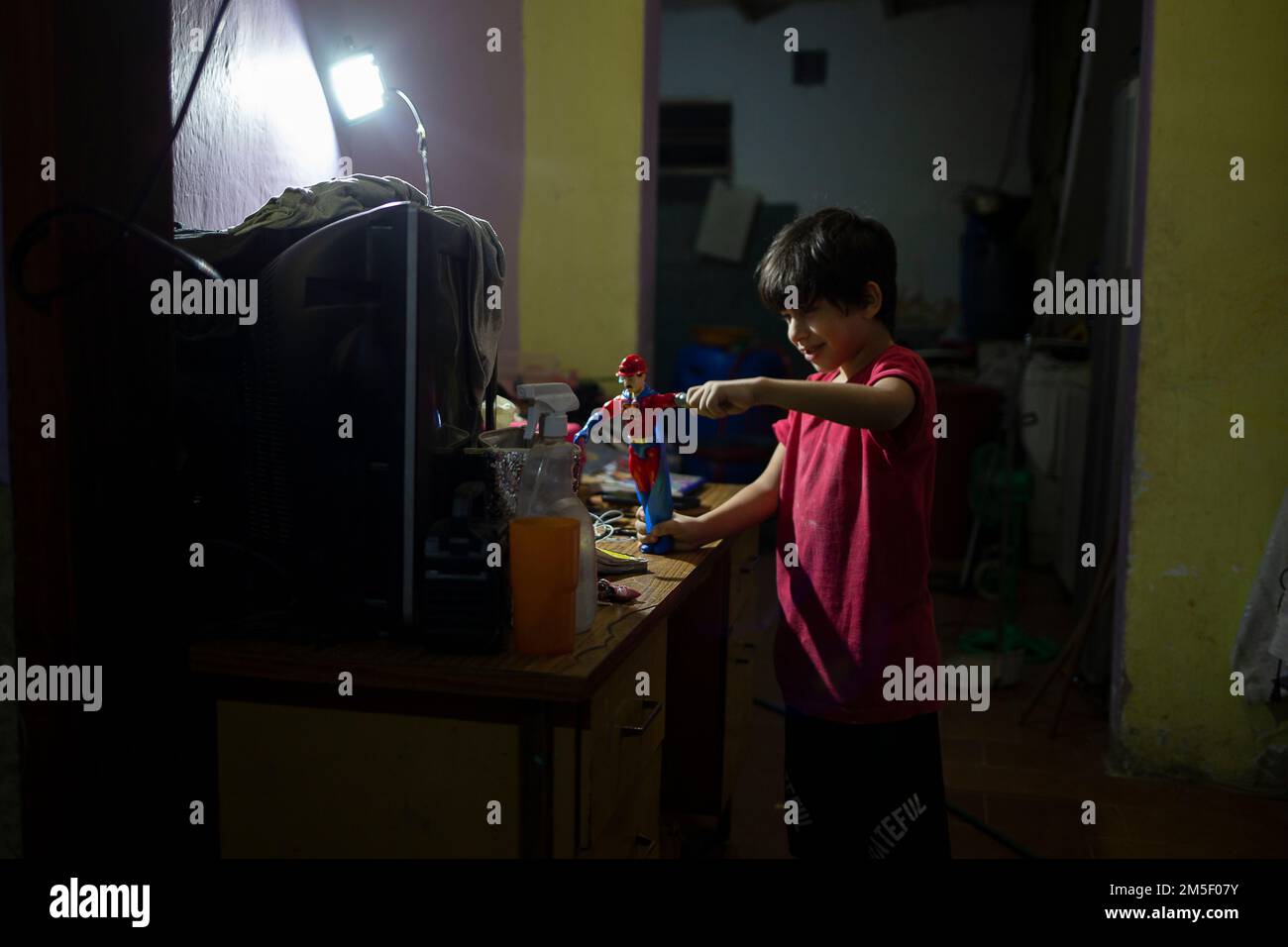 Caracas, Venezuela. 26th Dec, 2022. A child plays with "Super Mustache ...