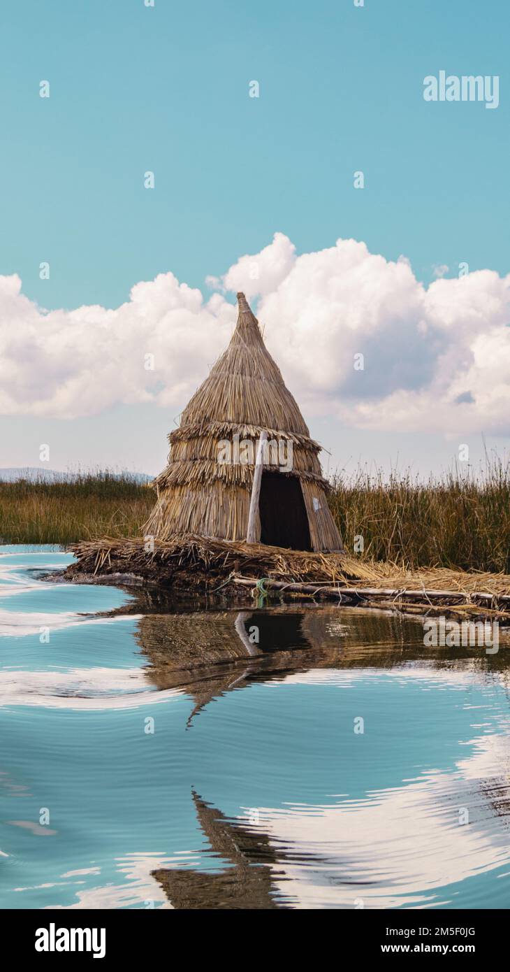 An aerial view of thatched structure in Uros Stock Photo - Alamy