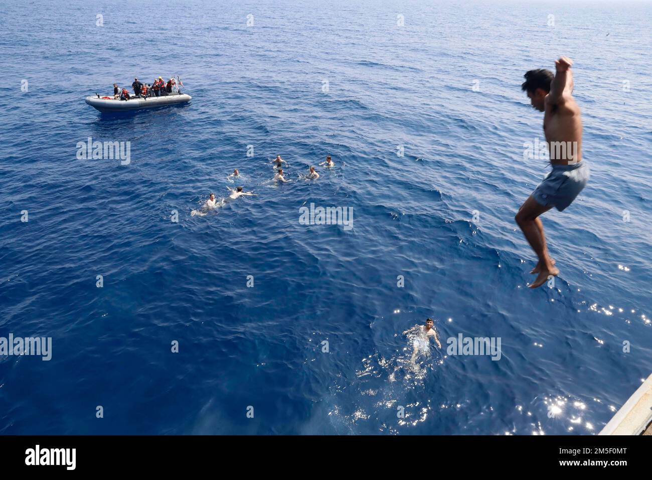 INDIAN OCEAN (March 9, 2022) Sailors participate in a swim call onboard ...