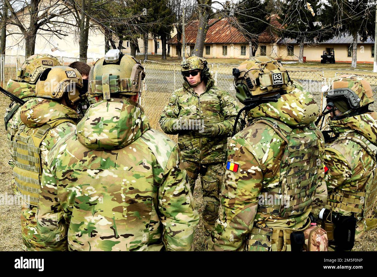A pararescuemen assigned to the 57th Rescue Squadron, center, briefs ...