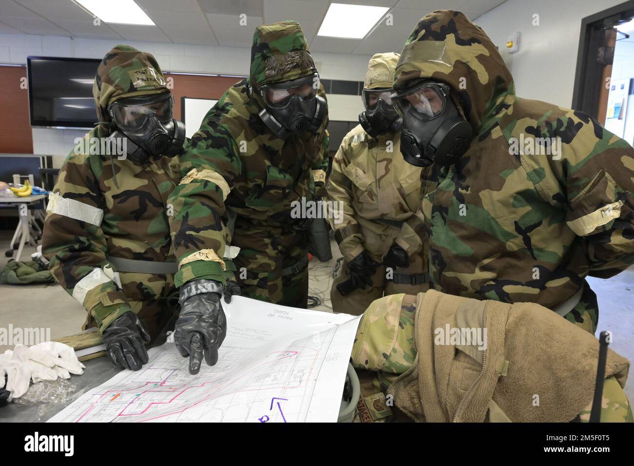 U.S. Air Force emergency management members from left to right Tech ...