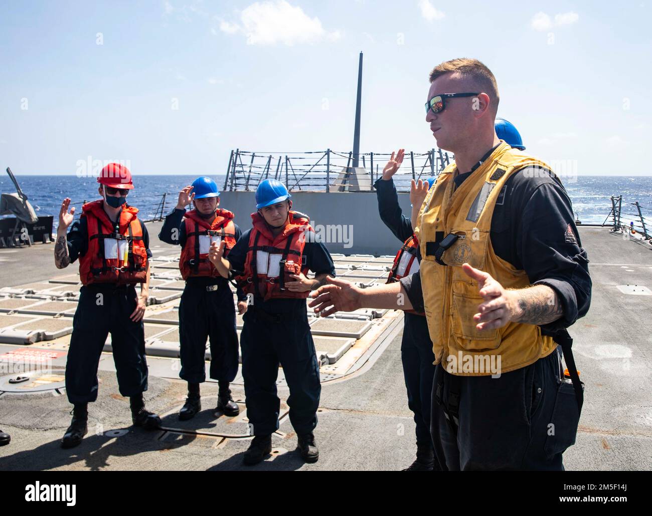 PHILIPPINE SEA (March 9, 2022) Boatswain’s Mate 2nd Class Reece Weaver ...