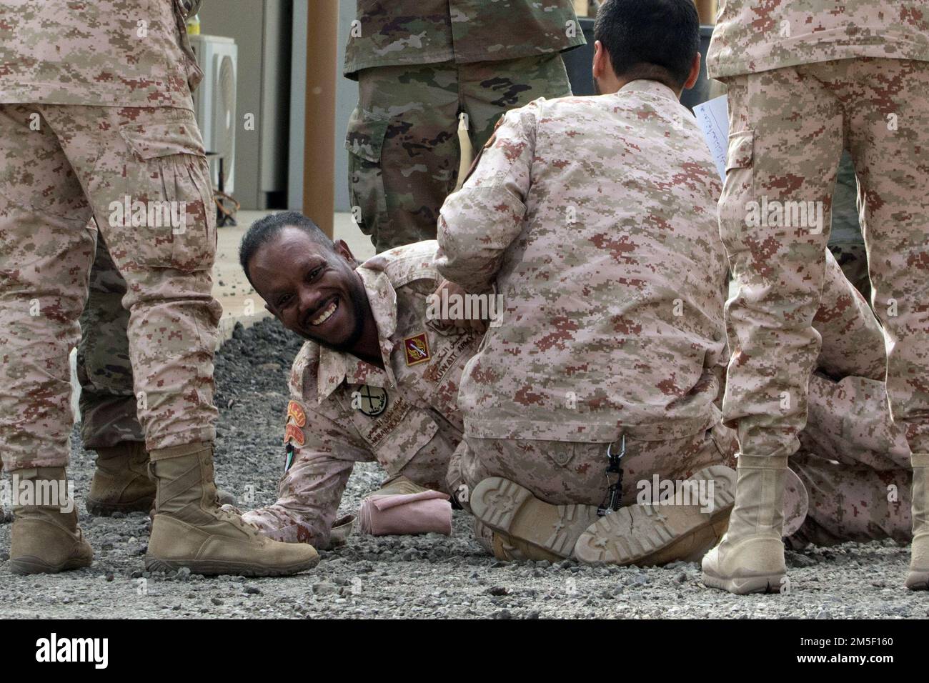 A Kuwaiti soldier smiles during a combined medical expertise exchange ...