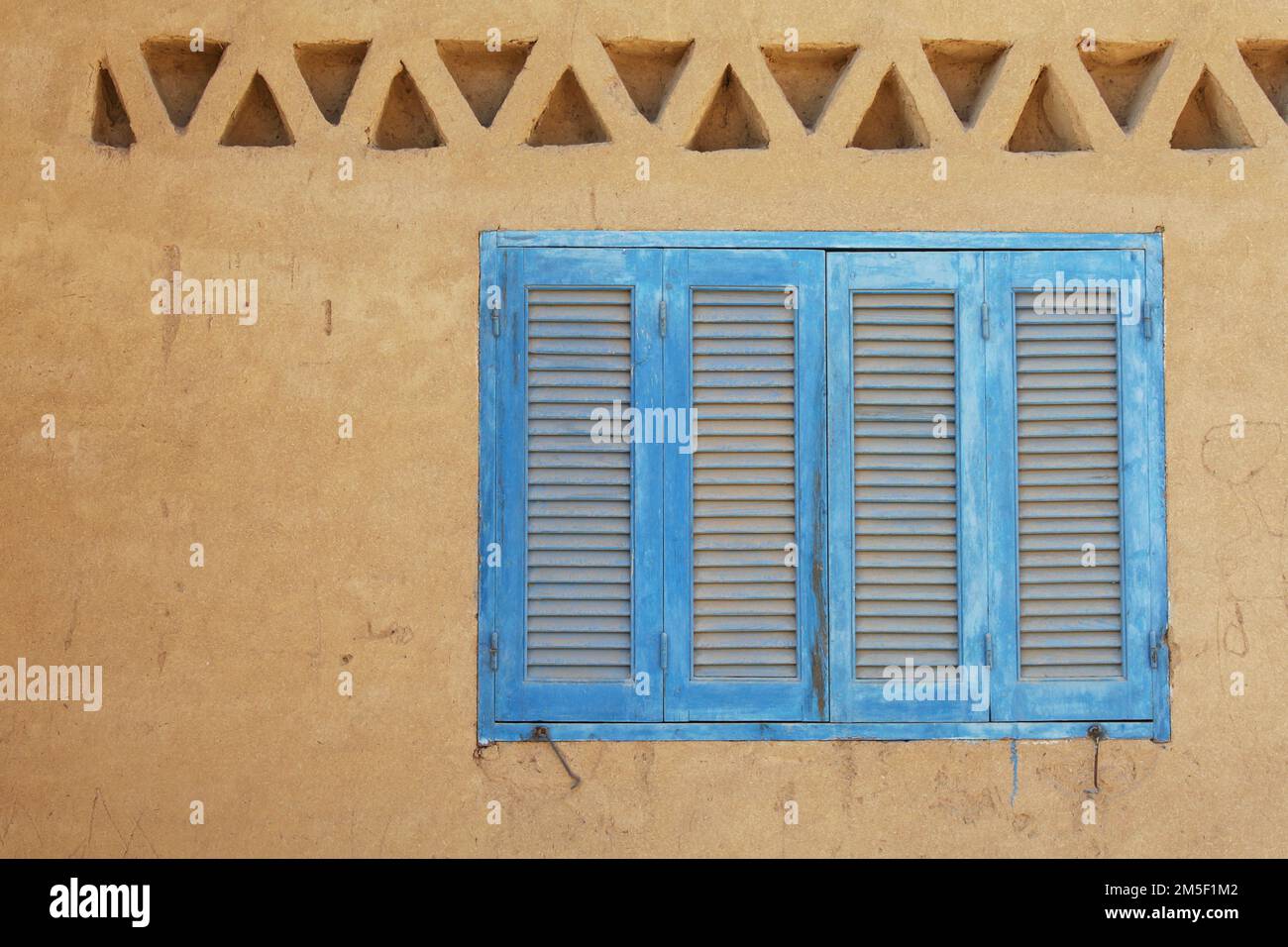 Blue Egyptian window with Nubian decoration Stock Photo - Alamy