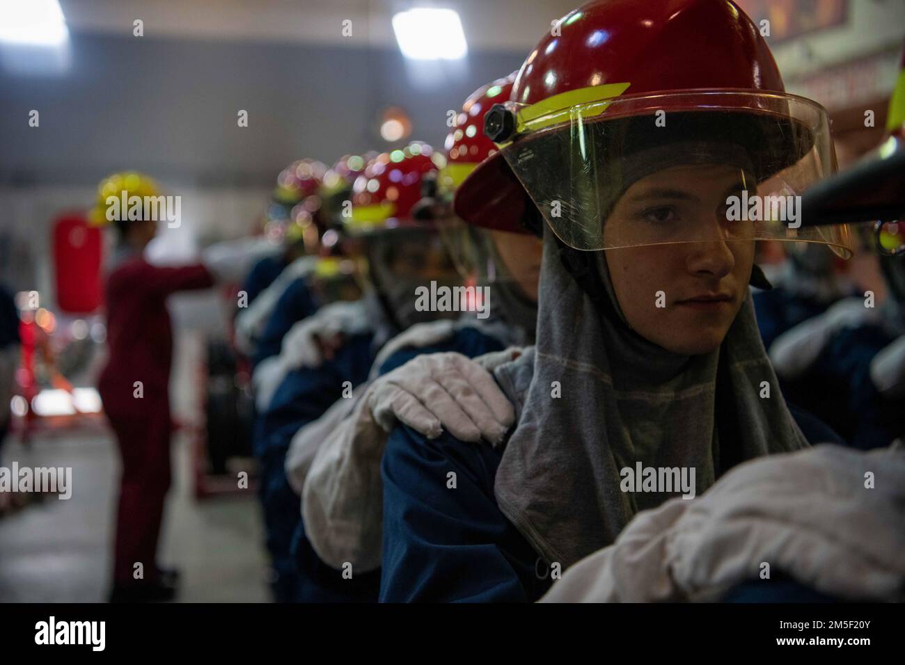 Recruits participate in firefighting and damage control training inside ...
