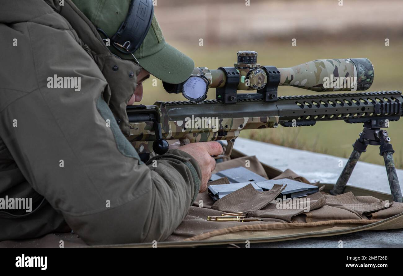 A Lithuanian Special Forces sniper conducts sniper range qualifications ...
