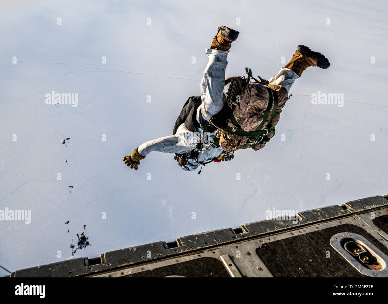 Naval Special Warfare members perform a high-altitude low-opening jump ...