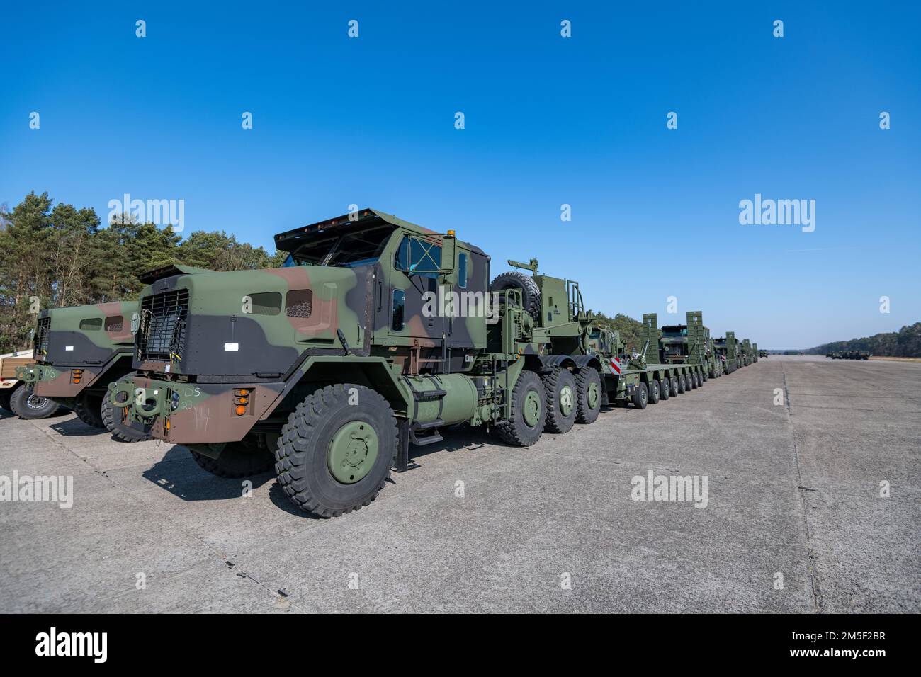 U.S. Army Enhanced Heavy Equipment Transporter Systems line up in the ...