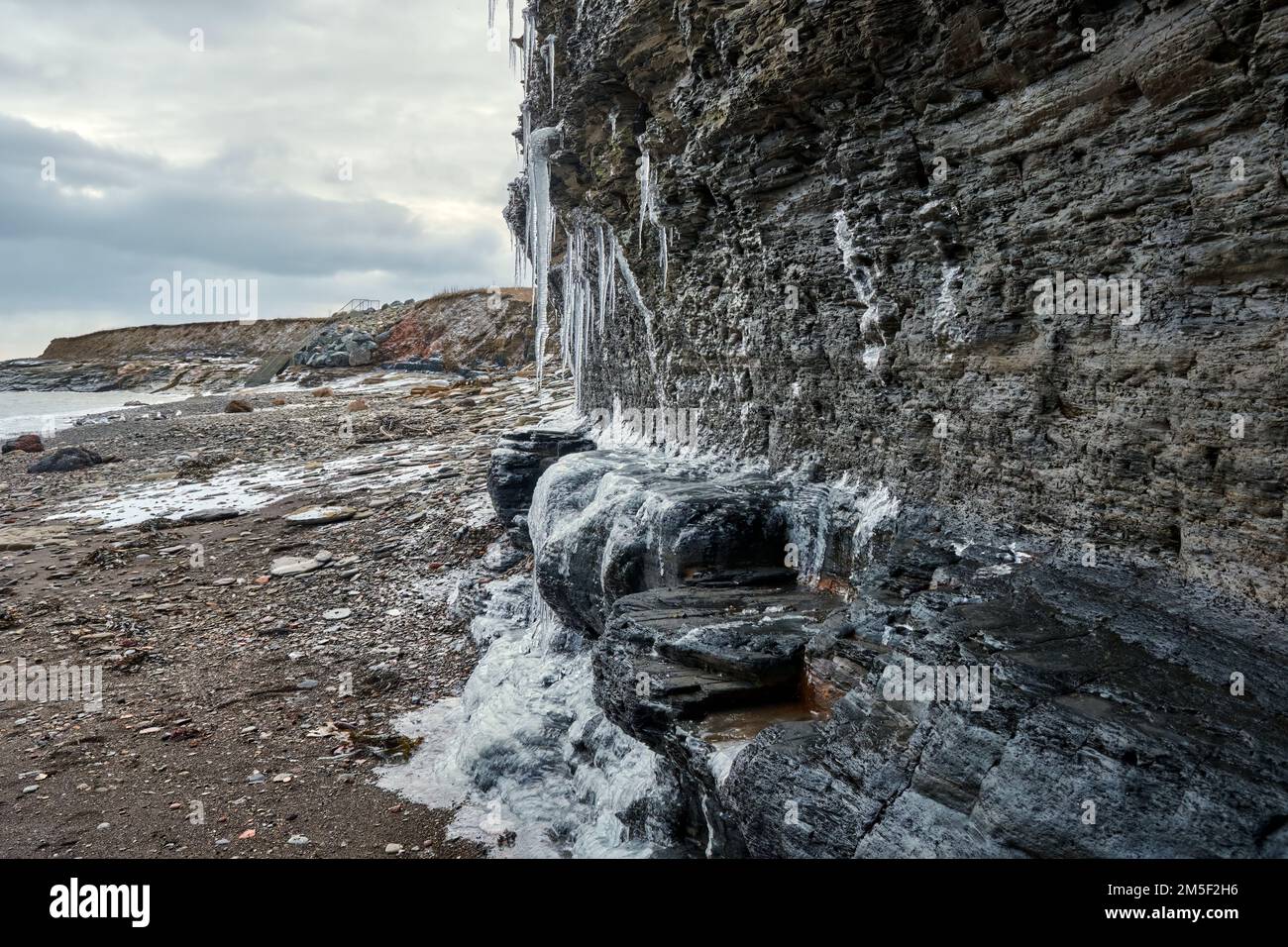Icicles cling to the cliff near an old abandoned coal mine at Tablehead ...