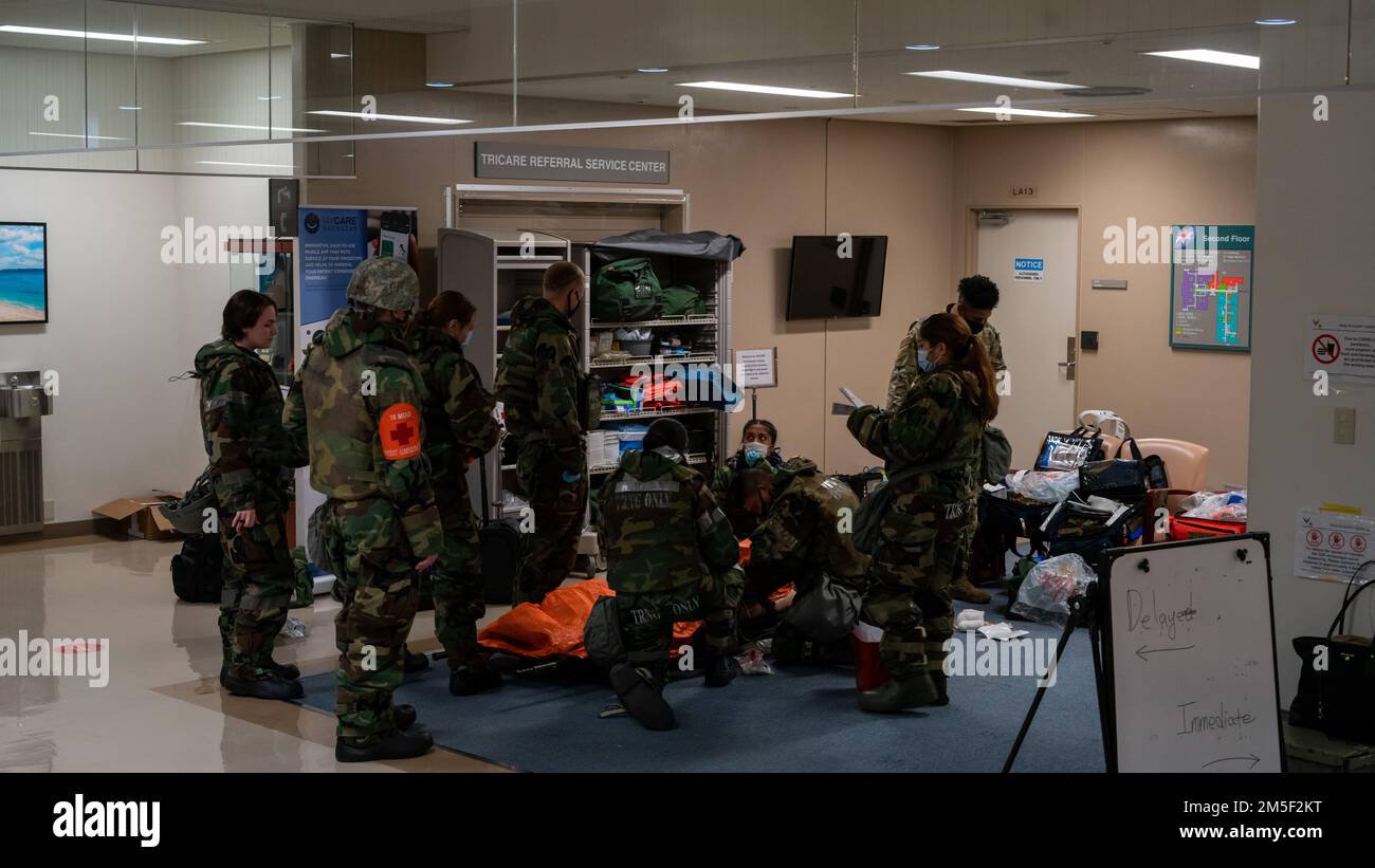 Airmen assigned to the 18th Medical Group simulate a medical triage ...