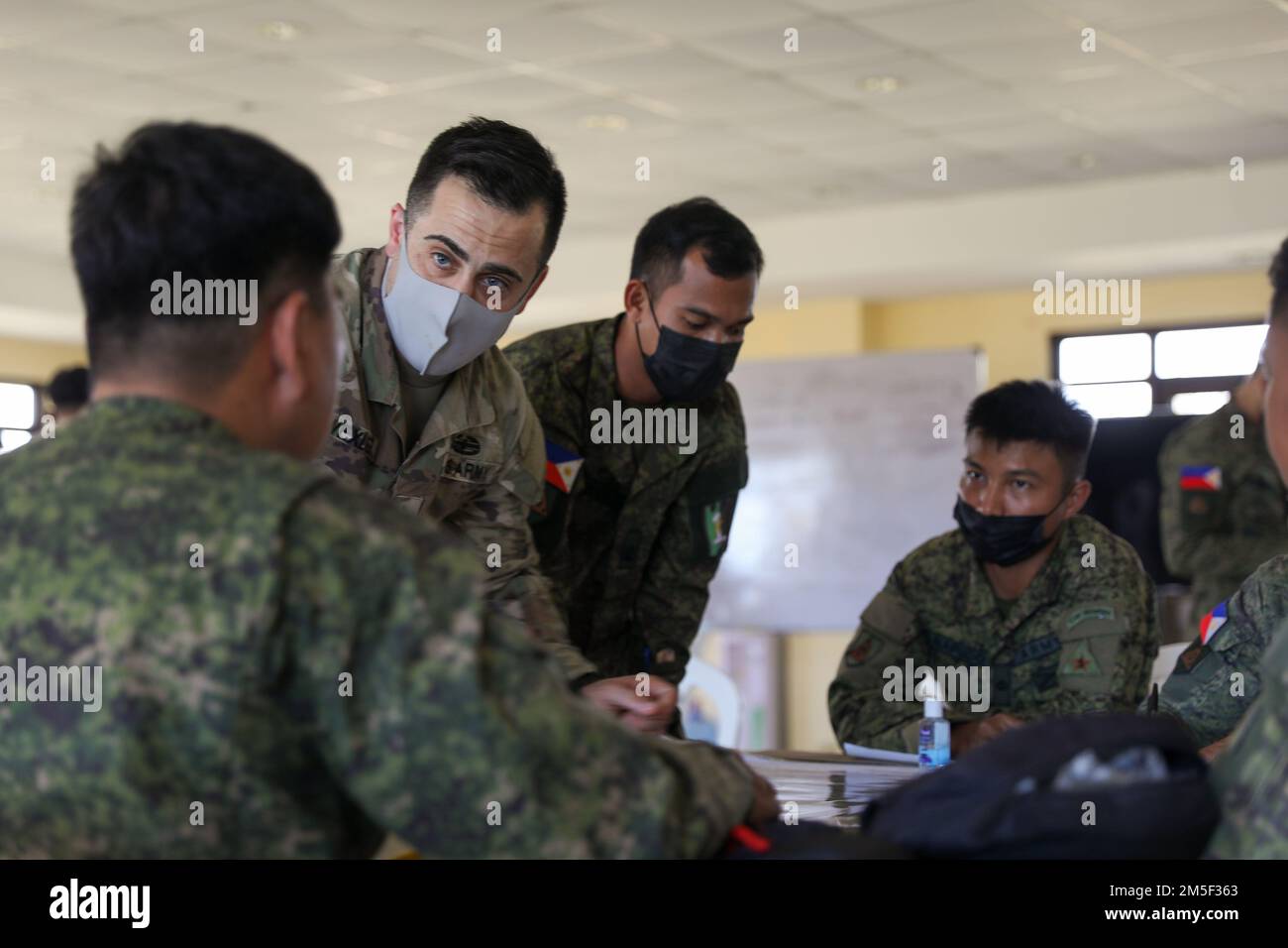 U.S. Army Staff Sgt. Michael Wexler, an intelligence advisor assigned ...