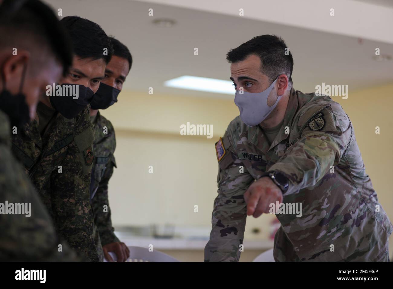 U.S. Army Staff Sgt. Michael Wexler, an intelligence advisor assigned ...