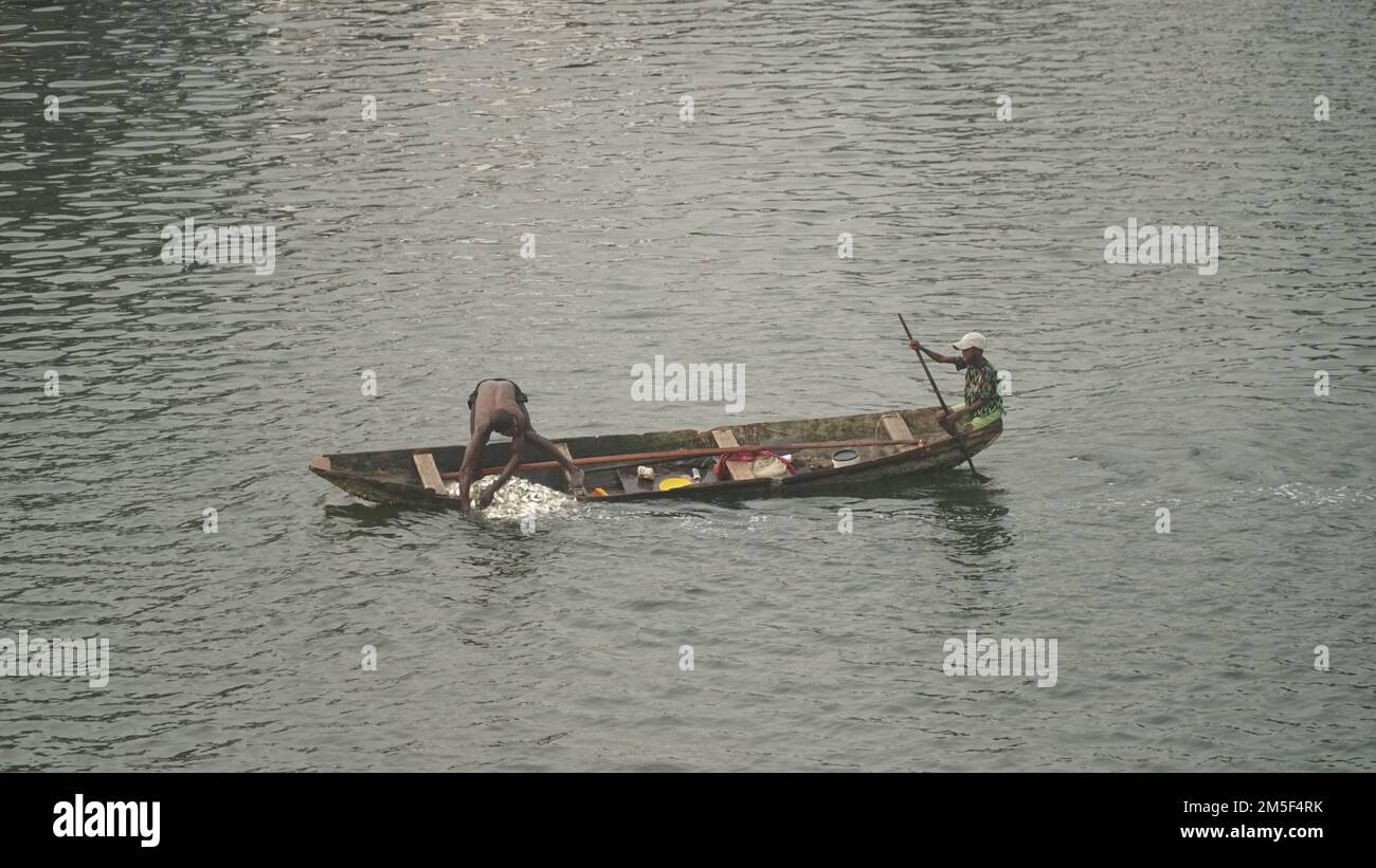 Fisherman in Lagos Lagoon Stock Photo - Alamy