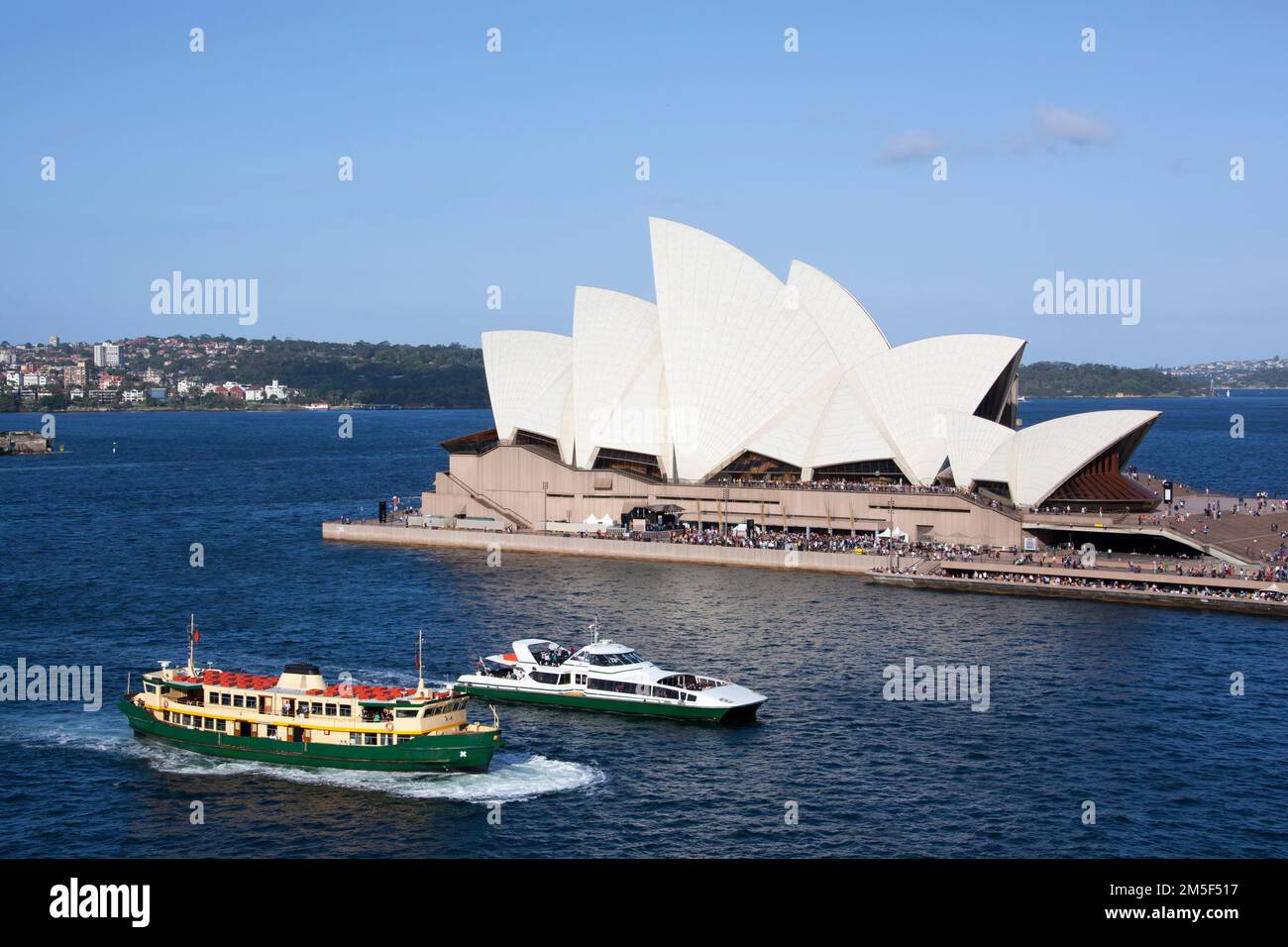 The aerial view of different type ferry boats arriving back to Sydney ...