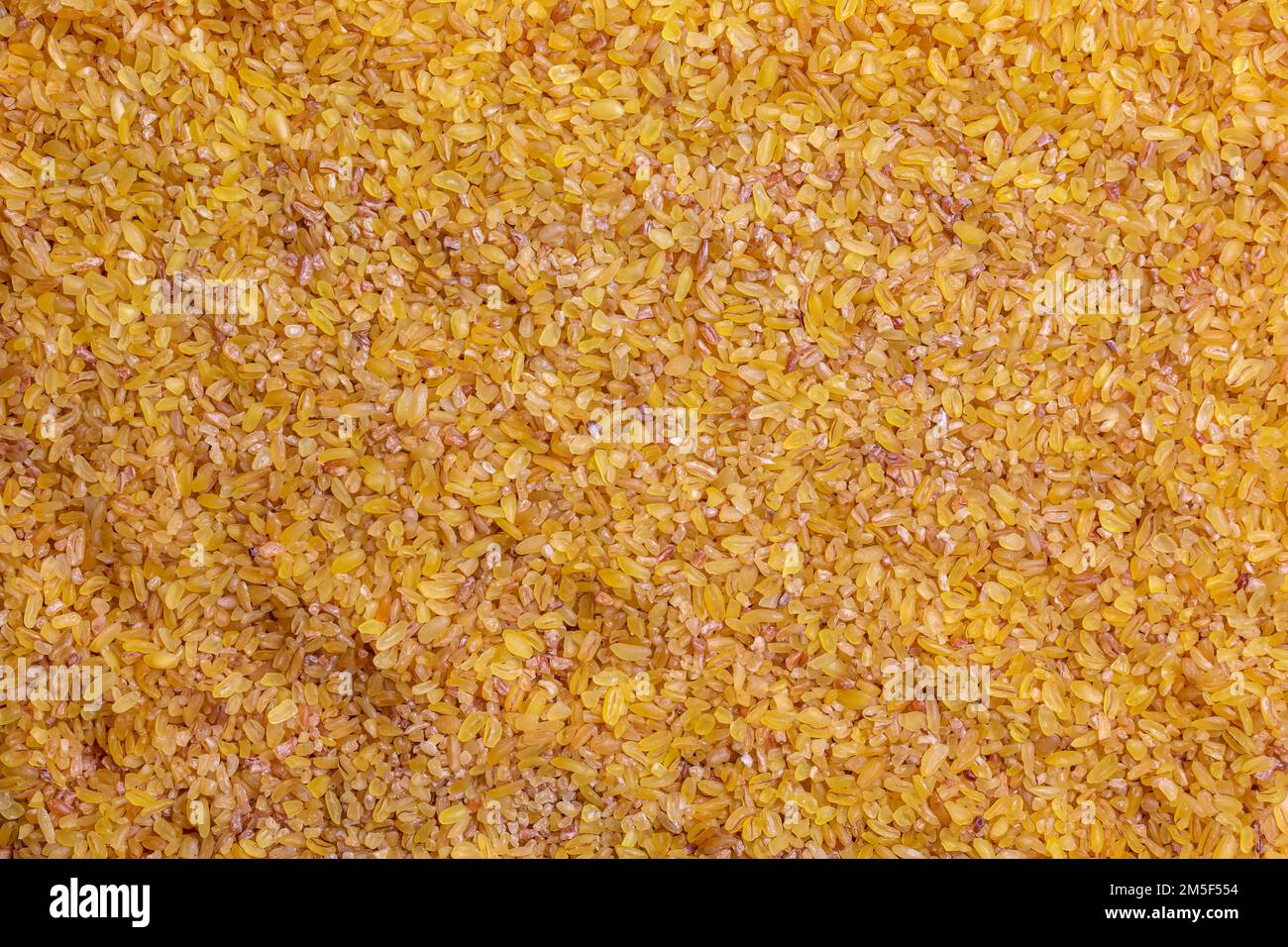 Raw bulgur background. Bulgur is a natural source of protein, fiber and ...