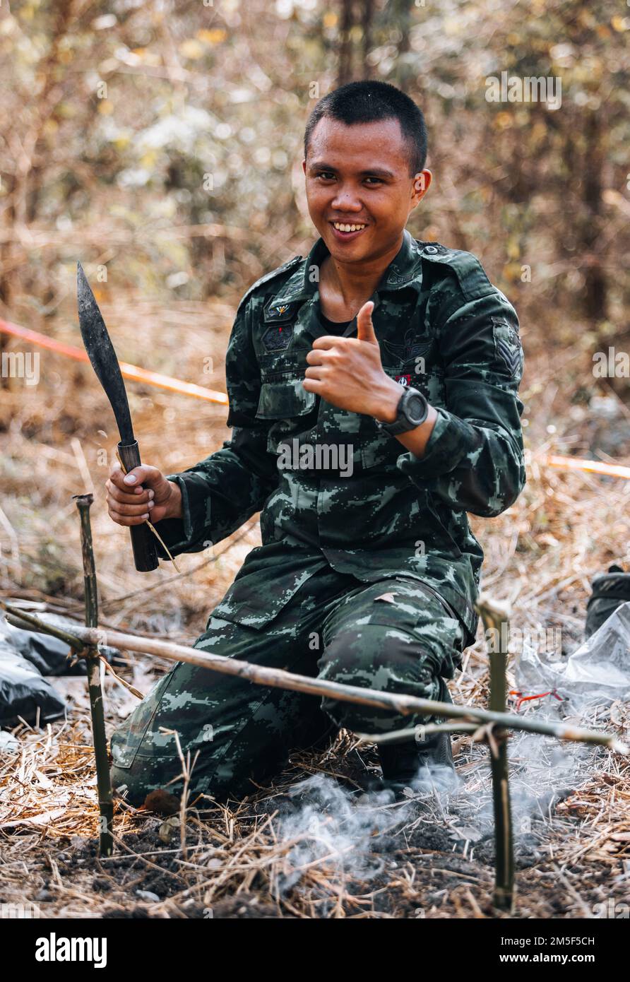 A Royal Thai Army Special Forces Soldier smiles at the camera as he ...