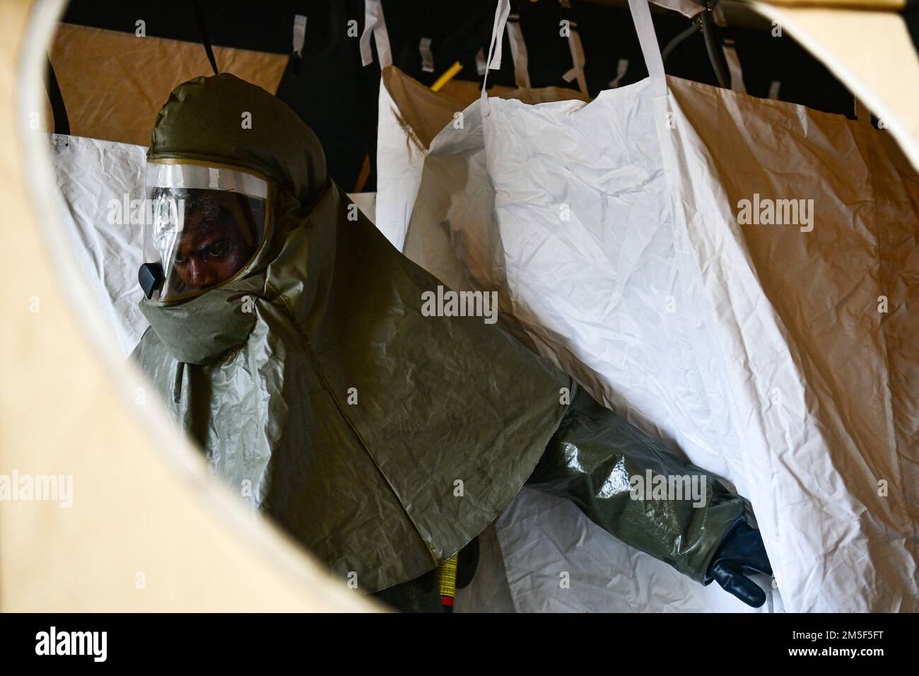An In Place Patient Decon (IPPD) team member from the 8th Medical Group ...