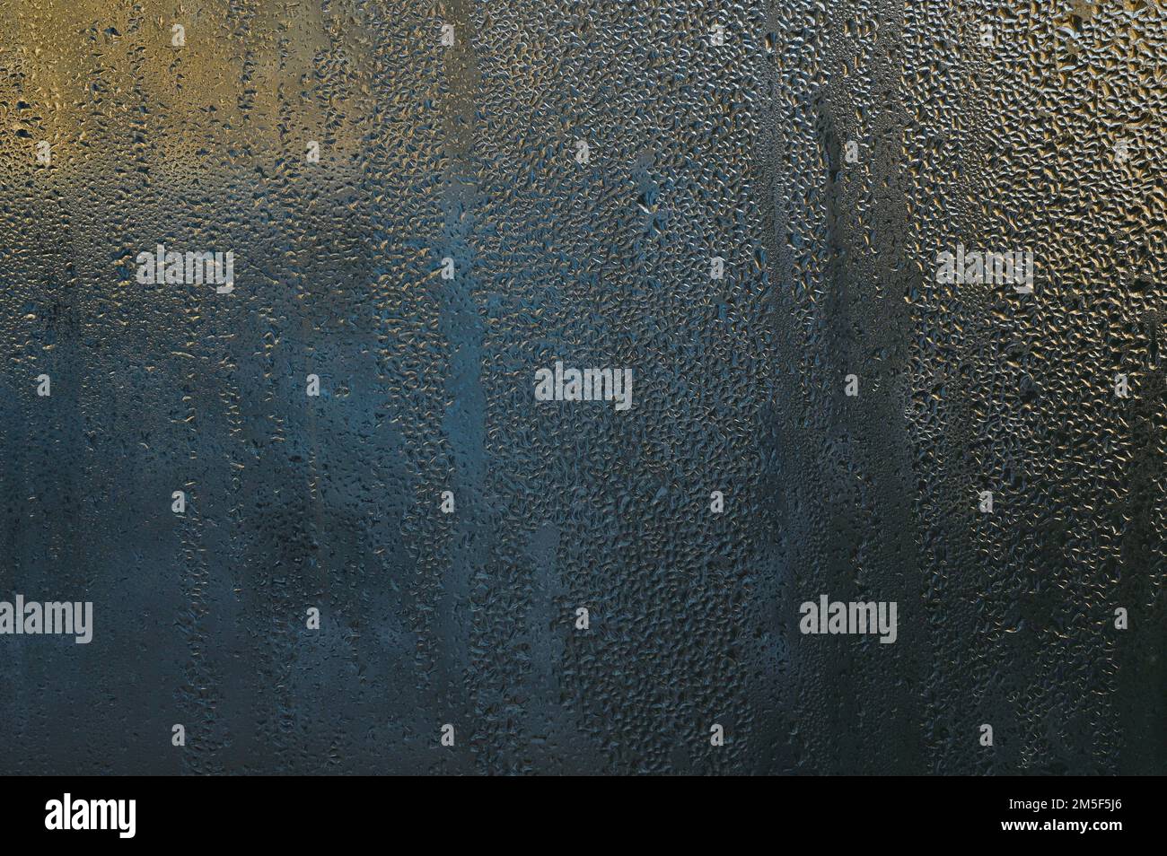 water flows on the glass. condensation drops on the window Stock Photo ...