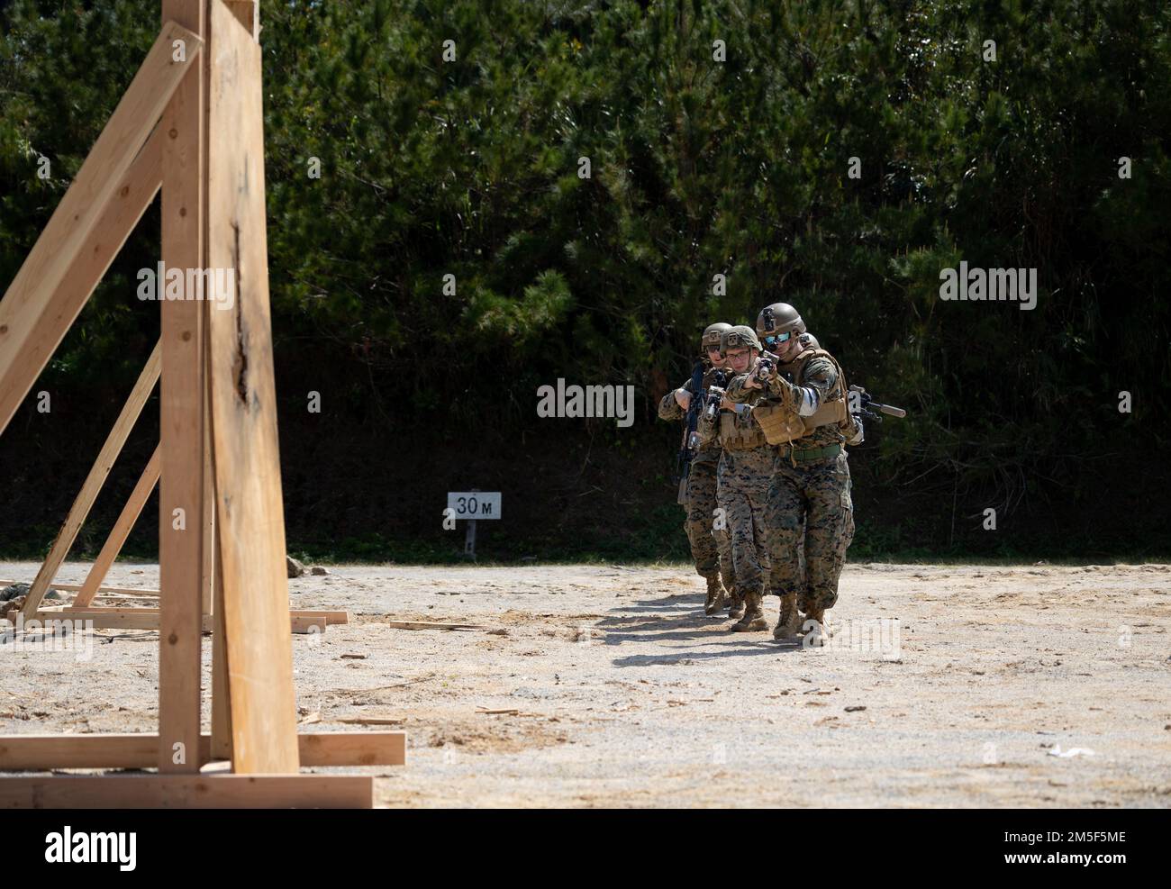 U.S. Marines with 1st Battalion, 3d Marines, 3d Marine Division conduct ...