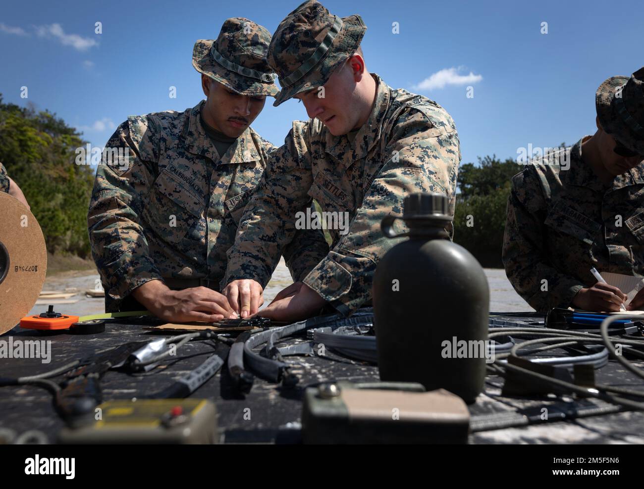 U.S. Marine Corps Lance Cpl. Cristian Calerochalarca, left, and Lance ...