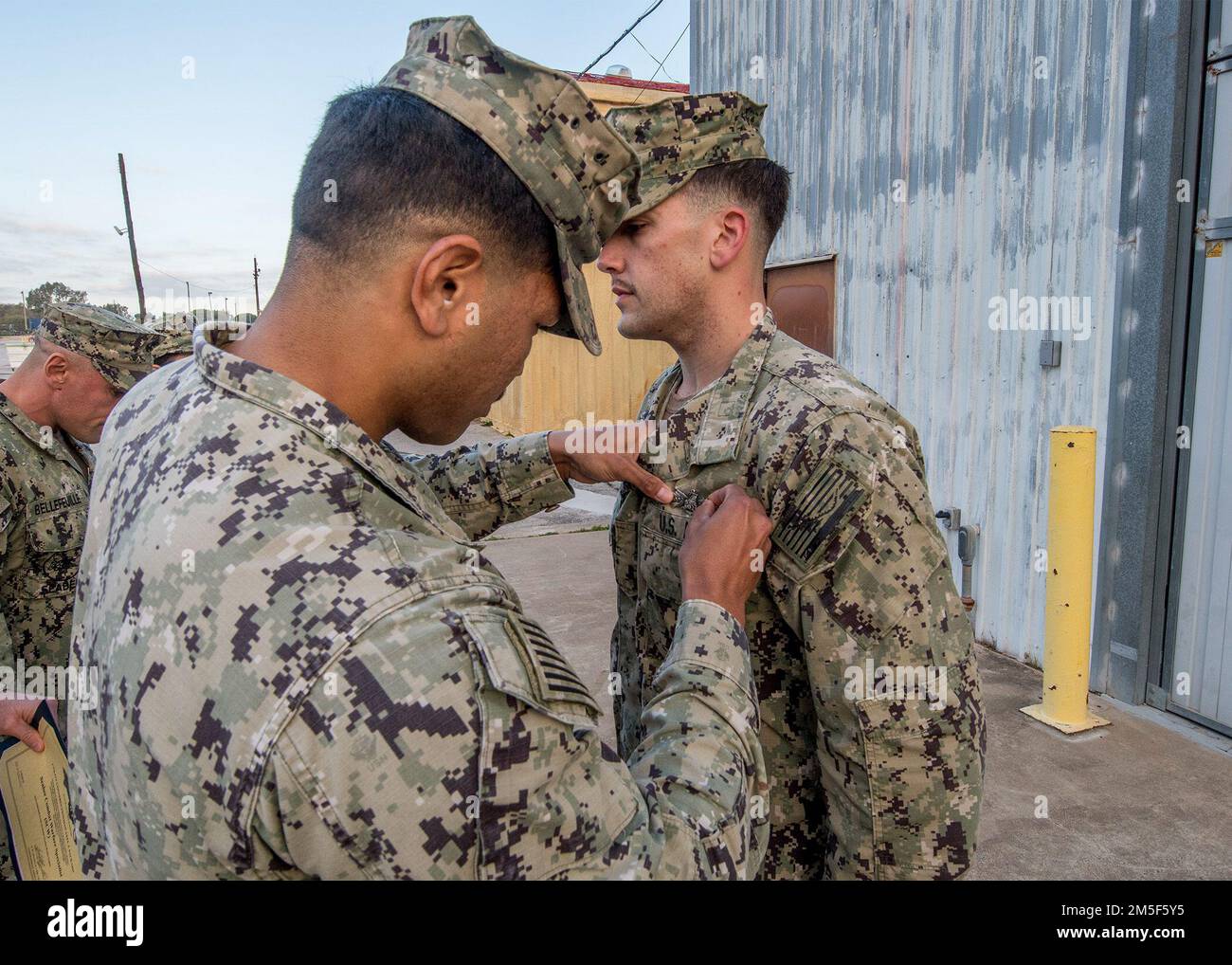 Utilitiesman Constructionman Axel Packard receives the Seabee Combat ...