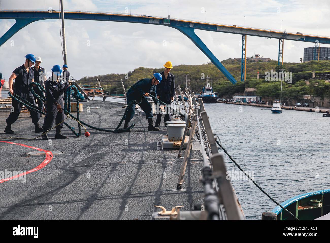 220310-N-GF955-1018 WILLEMSTAD, Curaçao - (March 10, 2022) -- Sailors ...