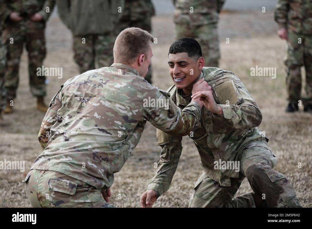U.S. Army Reserve Spc. Austin Pogreba, left, a chemical, biological ...