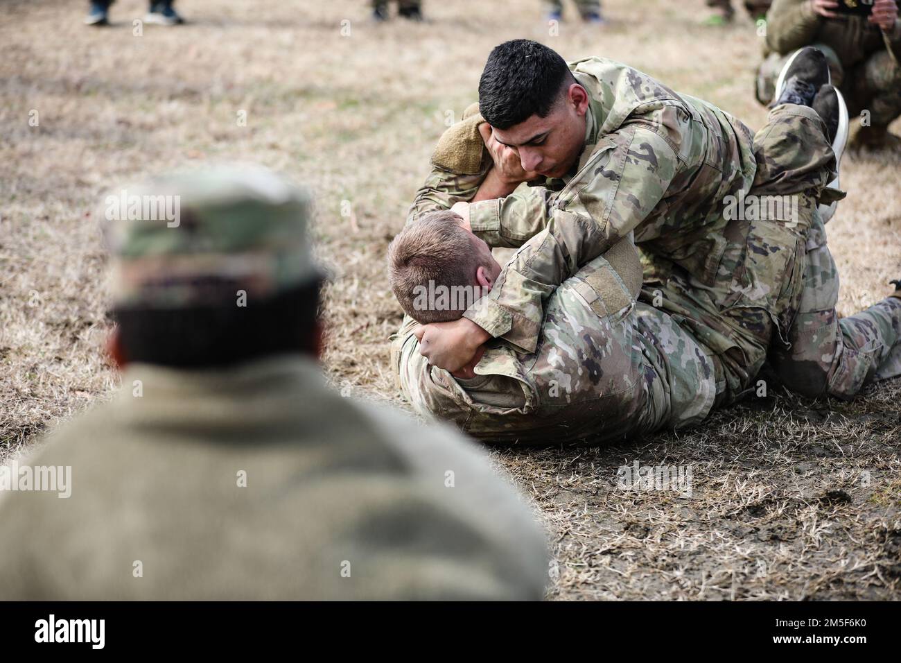 U.S. Army Reserve Spc. Austin Pogreba, left, a chemical, biological ...