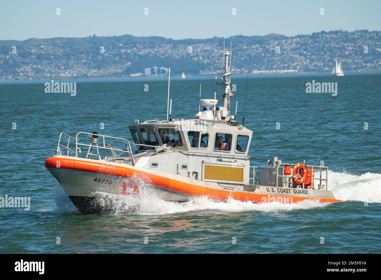 U.S. Coast Guard Station San Francisco crewmembers, aboard a 45-foot ...