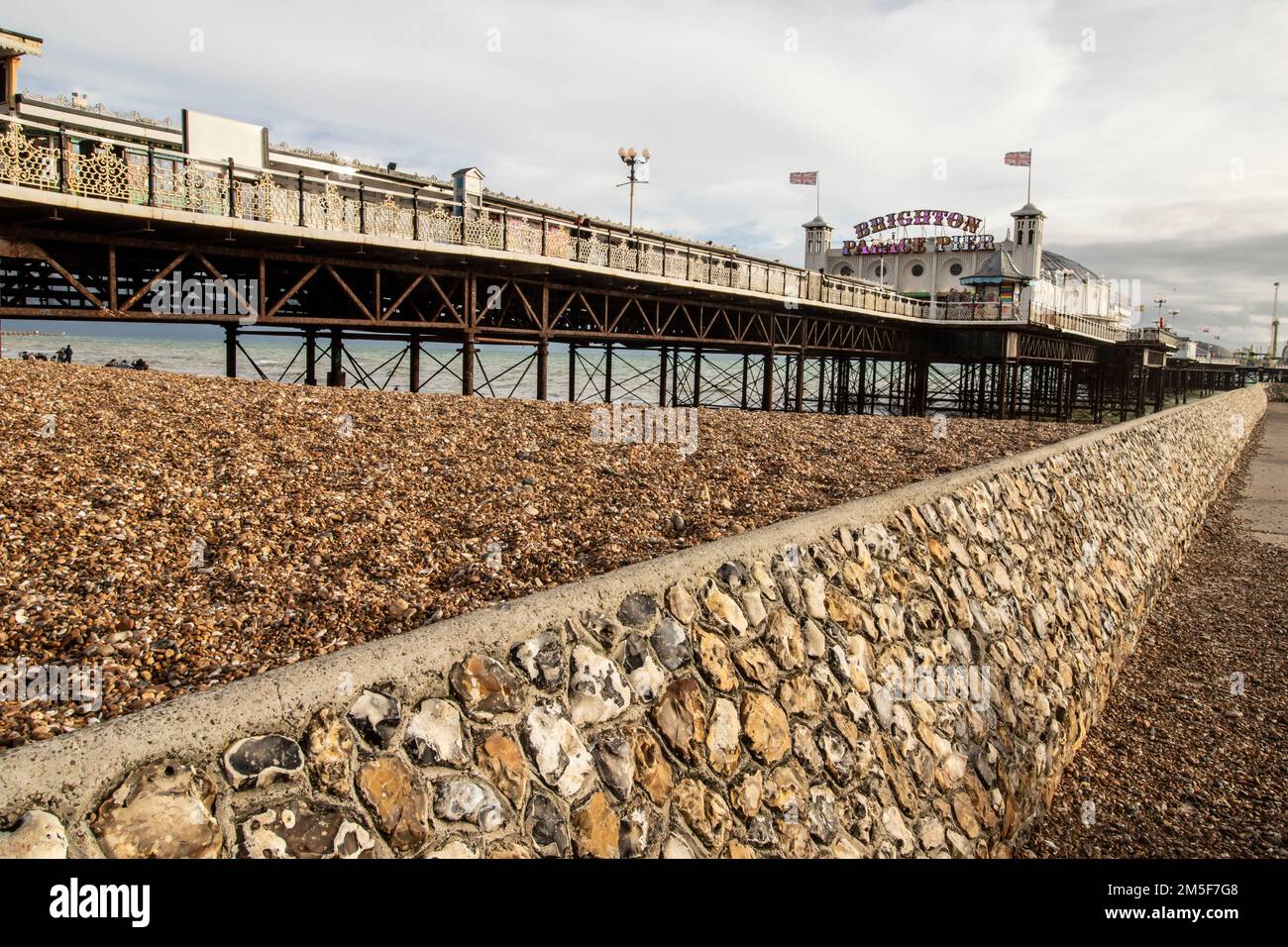 Hard light showing the strong textures in a stone wall and pointing ...
