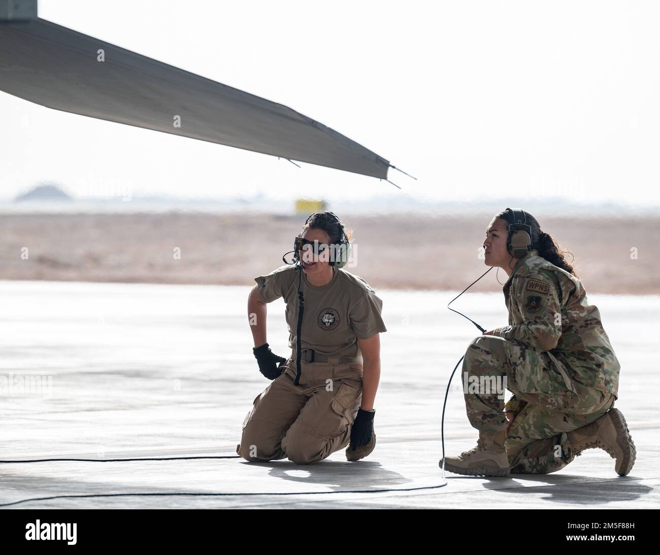 U.S. Air Force Staff Sgts. Jami DeVries, left, 120th Expeditionary ...